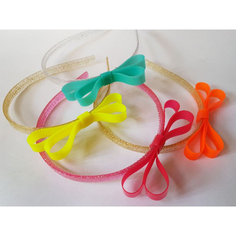 Arquinho Tiara Laço Silicone Modelo Chanel | Shopee Brasil