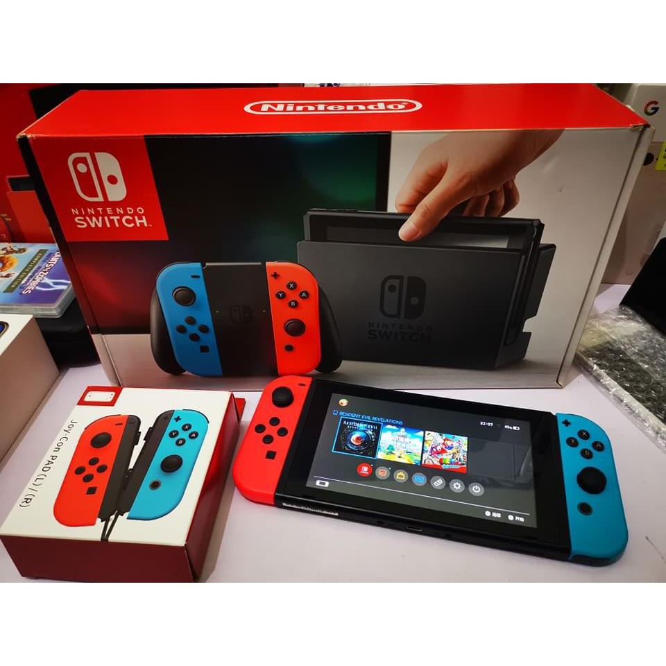 Console Nintendo Switch com par de Neon Red e Neon Blue Joy-Con | Shopee Brasil