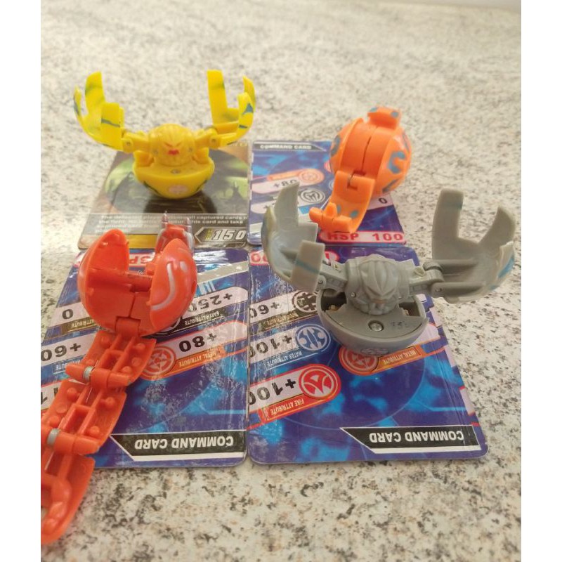 4 bakugans bolas grandes com 4 cartas para abrir + Boneco Bakugan ...