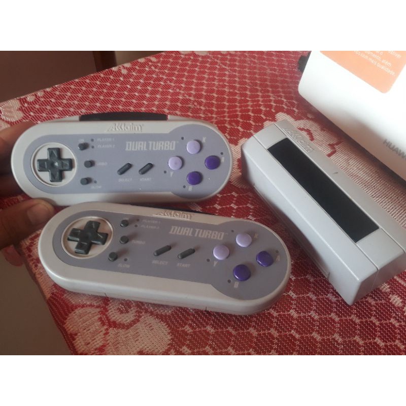 Par de controles aklaim de época snes FAT ler detalhes | Shopee Brasil