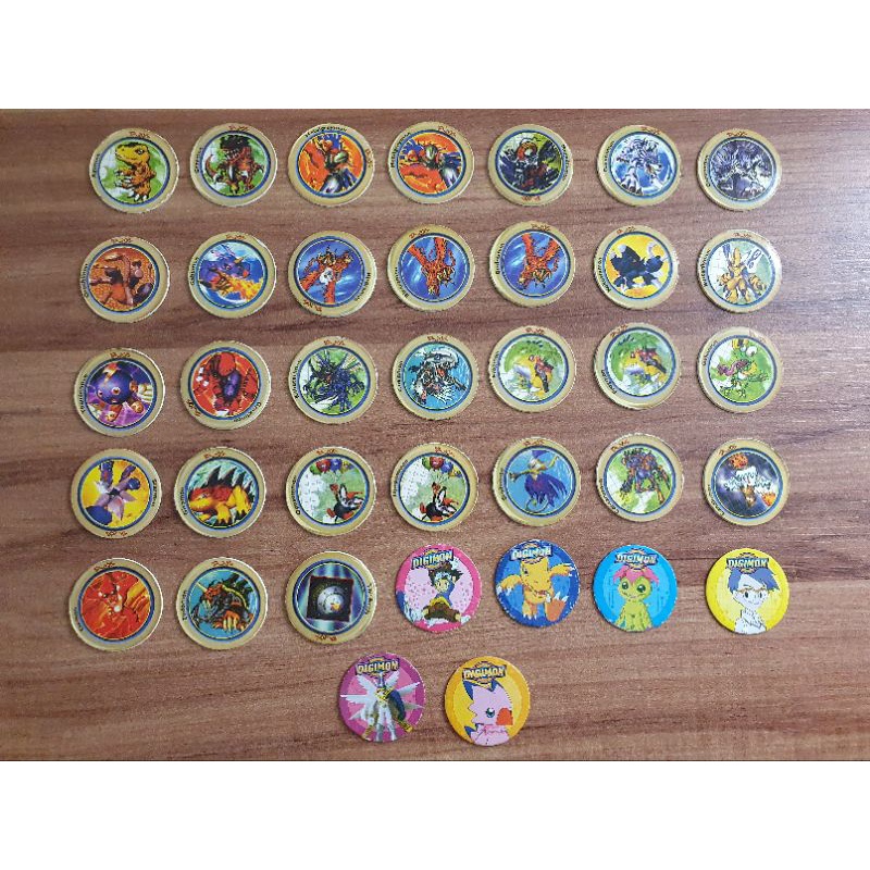 Tazos digimon | Shopee Brasil