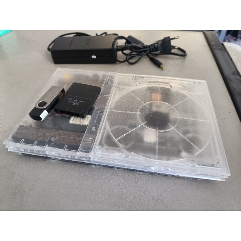 Ps2 slim modelo 70xxx, shell transparentel m.card+ pendrive 32gb pronto ...
