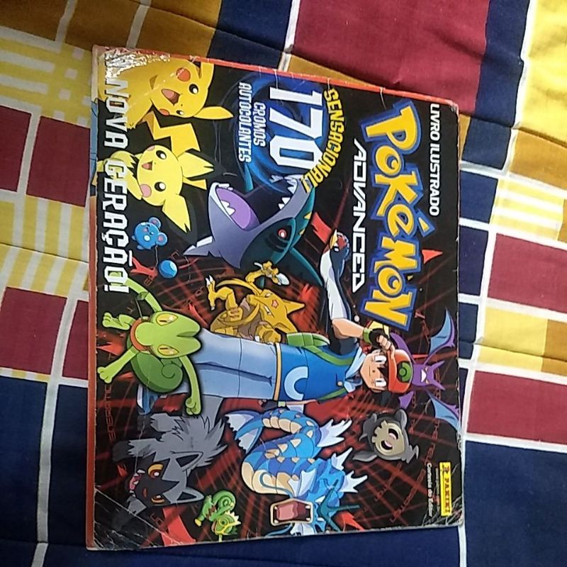 álbum sucata panini pokémon advanced. tem uma página recortada ...