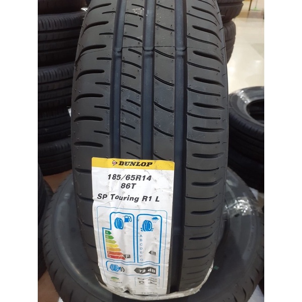 Pneu Dunlop sp Touring R1 Aro 14 185/65 R14 86T | Shopee Brasil